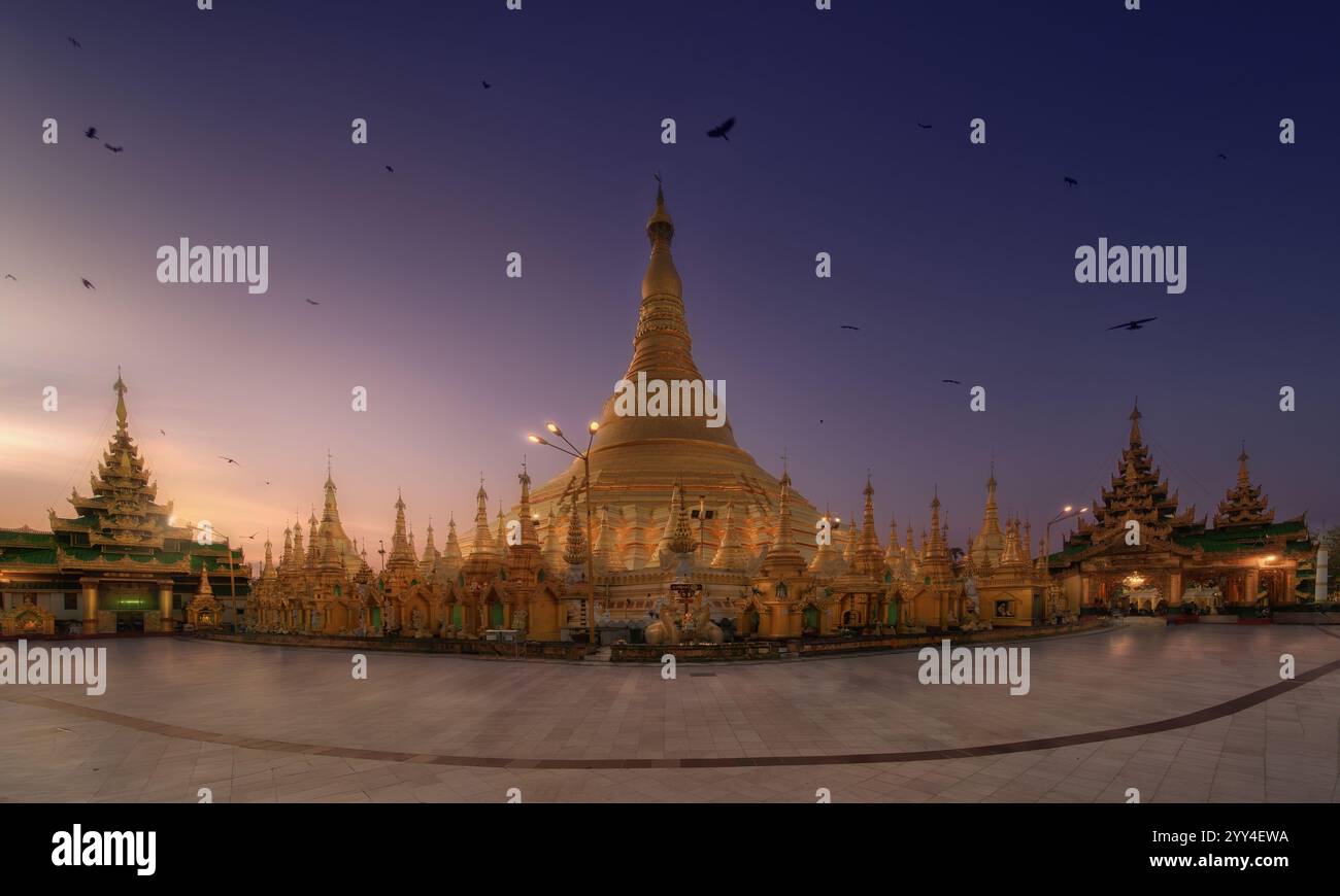 A stunning fine art image of a golden pagoda at dusk, surrounded by a ...