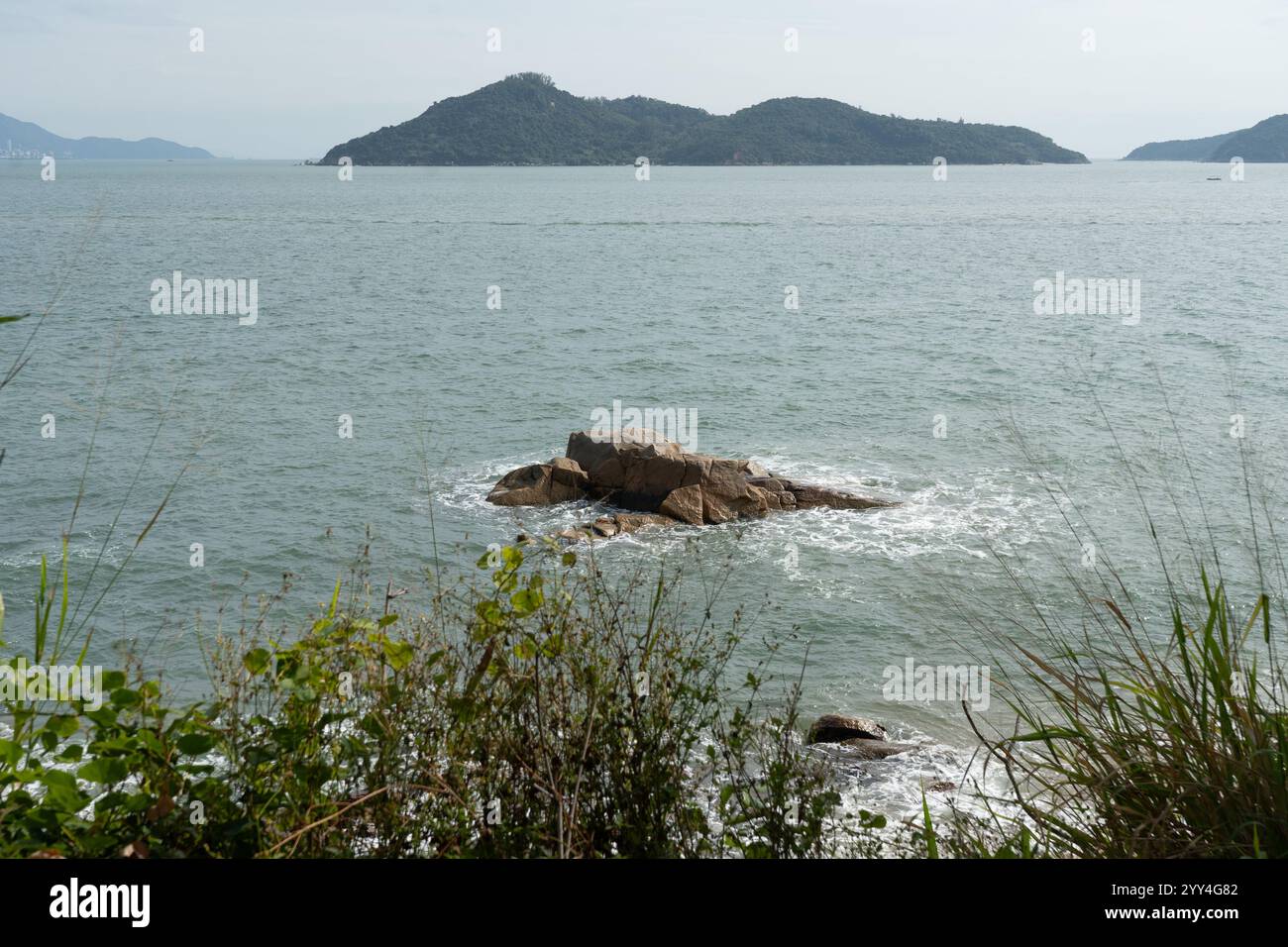 Sunshine island, top, is seen from Peng Chau island in Hong Kong. HKSAR ...