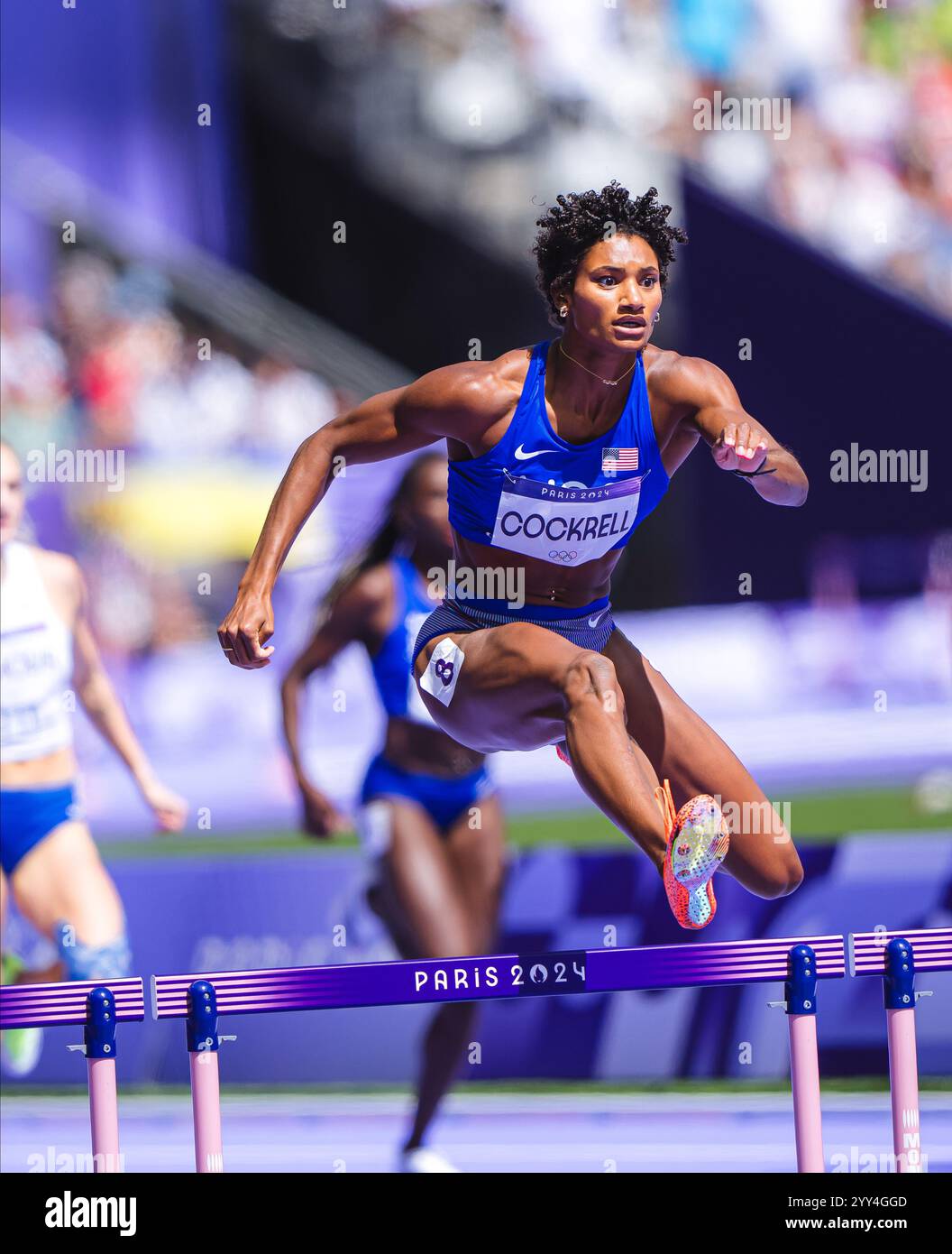Anna Cockrell participating in the 400 meters hurdles at the Paris 2024 ...