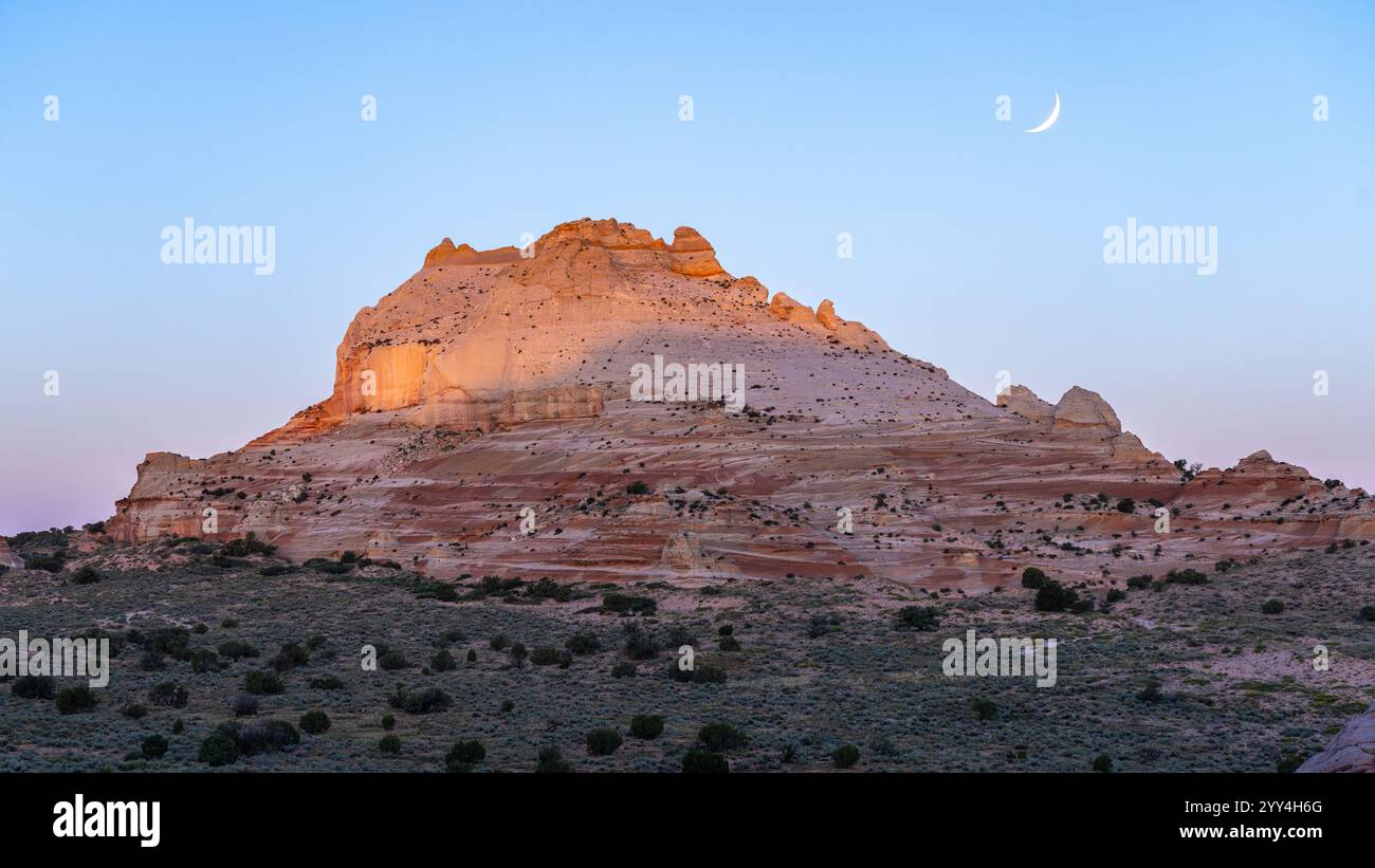 A breathtaking view of the White Pocket rock formation illuminated by ...