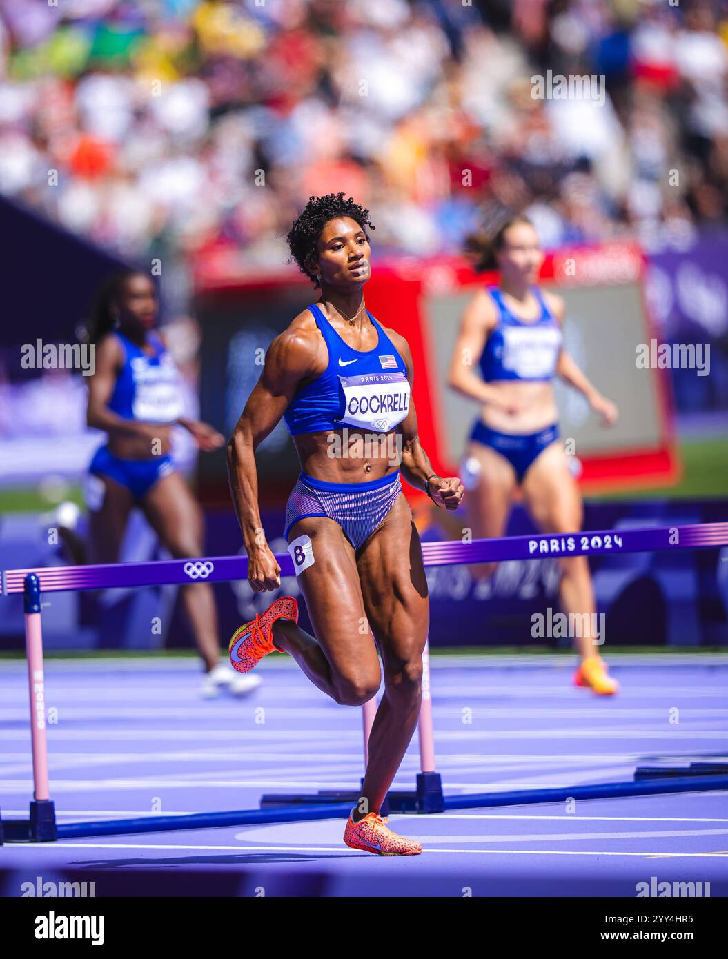 Anna Cockrell participating in the 400 meters hurdles at the Paris 2024 ...