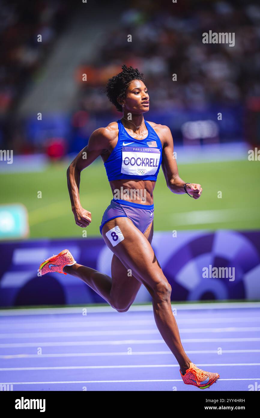 Anna Cockrell participating in the 400 meters hurdles at the Paris 2024 ...