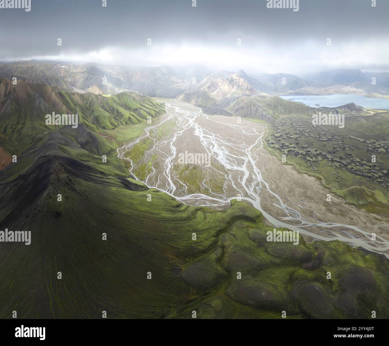 A stunning aerial capture of Iceland's vast river valley surrounded by ...