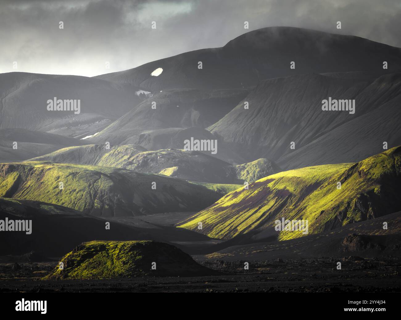 Stunning Icelandic landscape featuring vibrant green mountains under ...