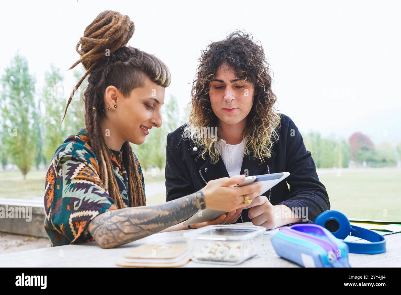 A tender scene featuring a transgender couple during a joyful outdoor ...
