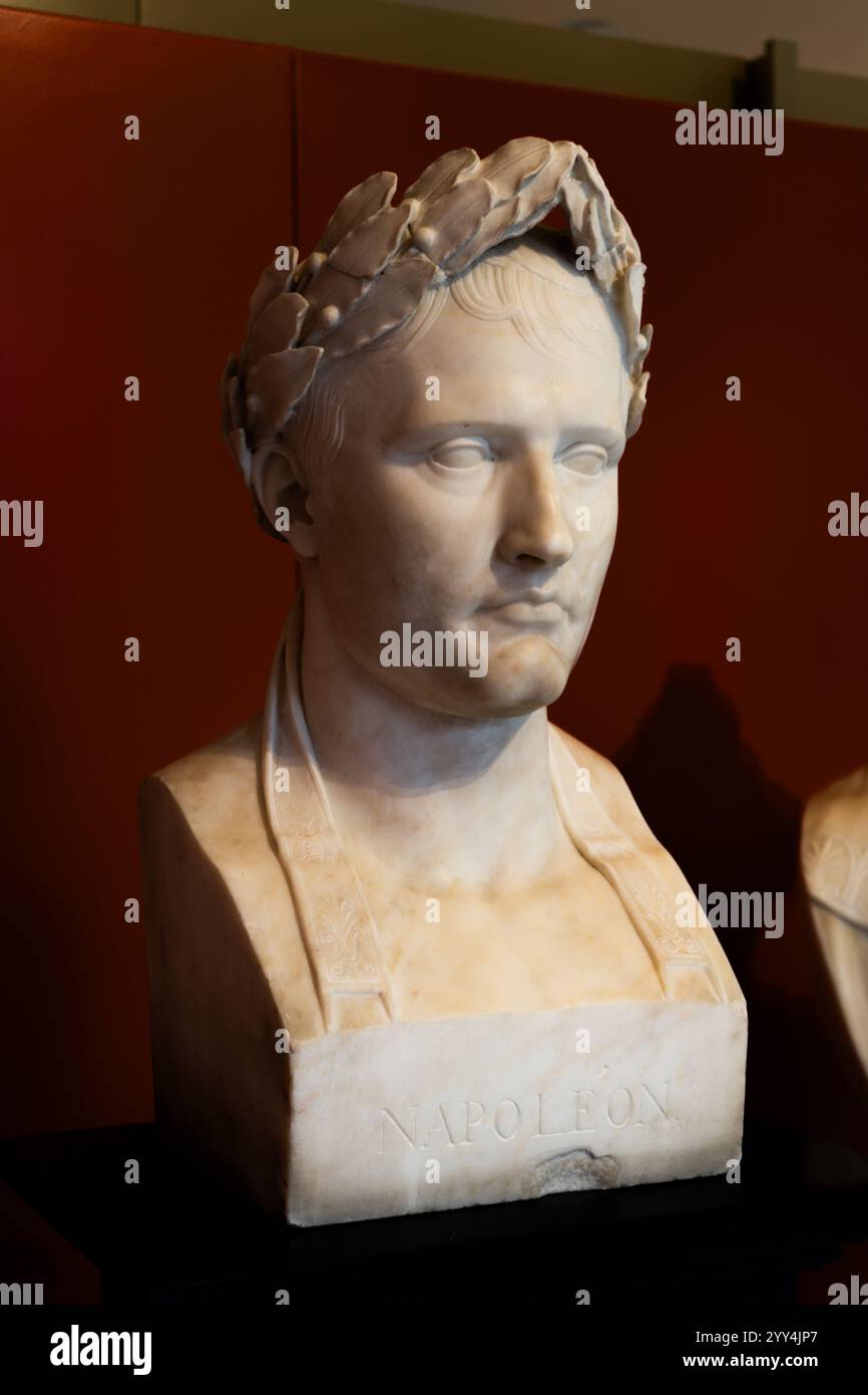 A detailed marble bust of Napoleon Bonaparte adorned with a laurel ...