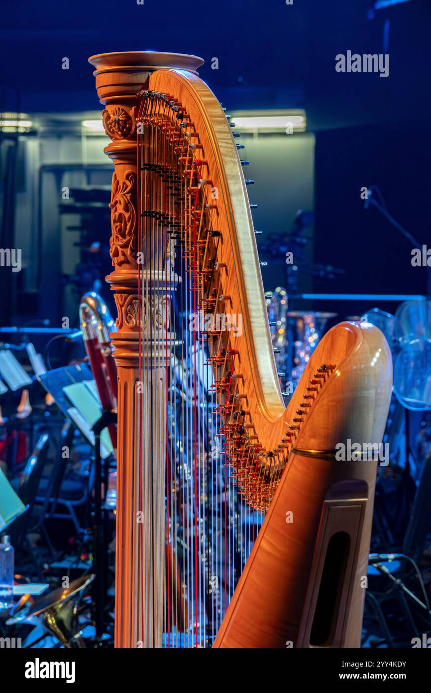 Classical music instrument harp on stage Stock Photo - Alamy