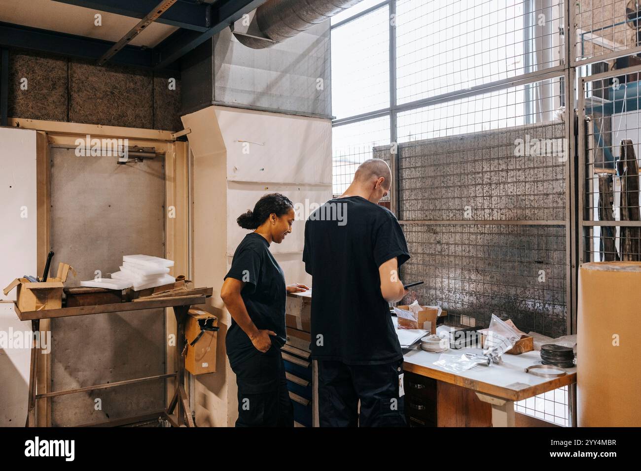 Female worker working in hi-res stock photography and images - Alamy