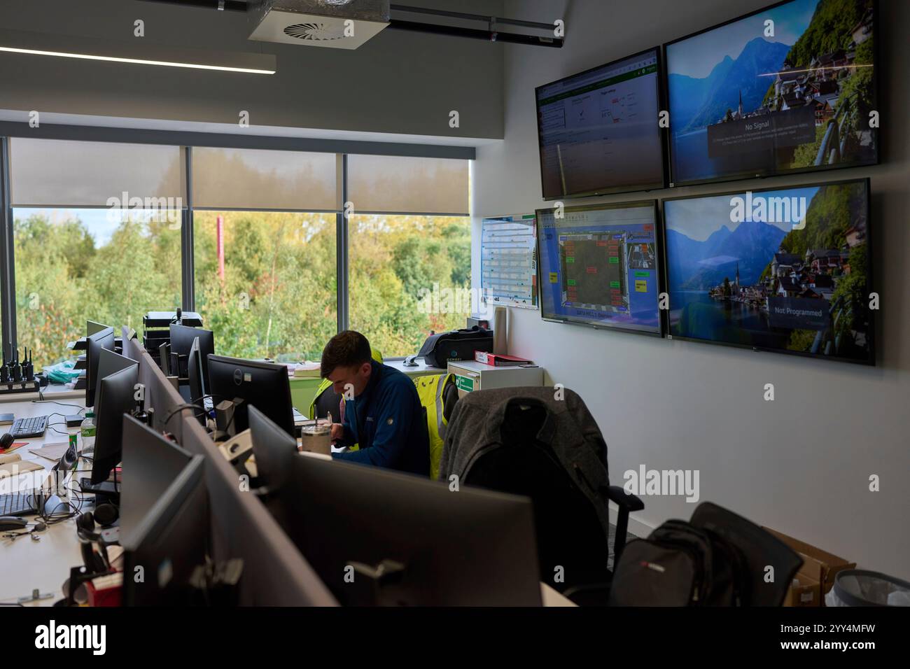 A worker sits inside the control centre of the Digital Realty data ...