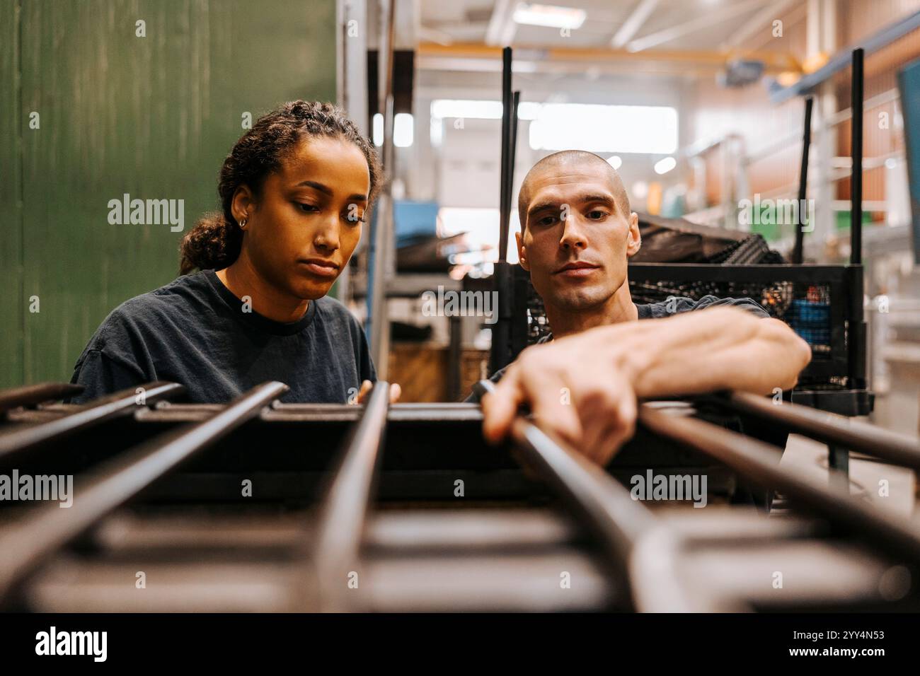 Male female coworker analyze work hi-res stock photography and images ...