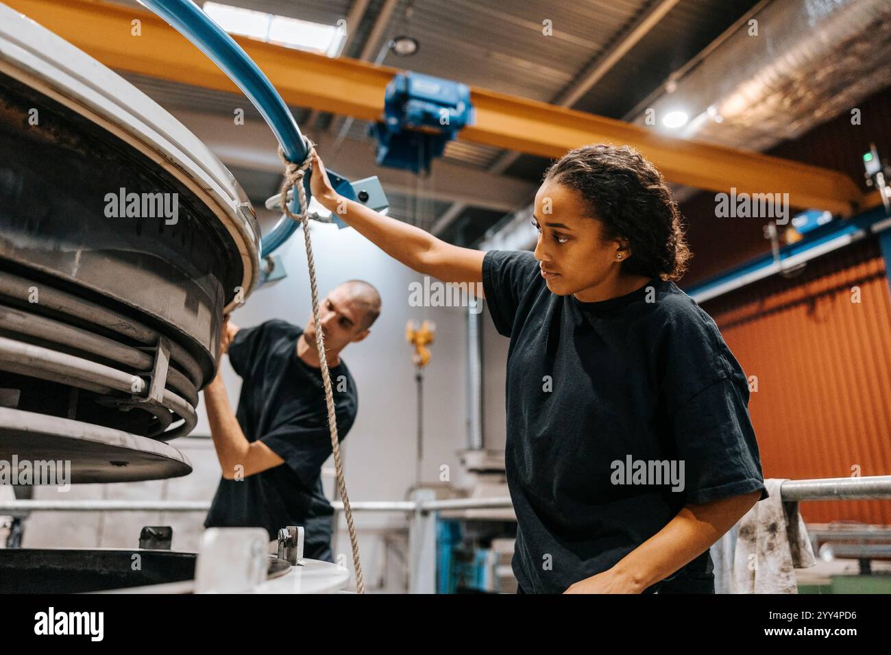Worker working on factory machines hi-res stock photography and images ...