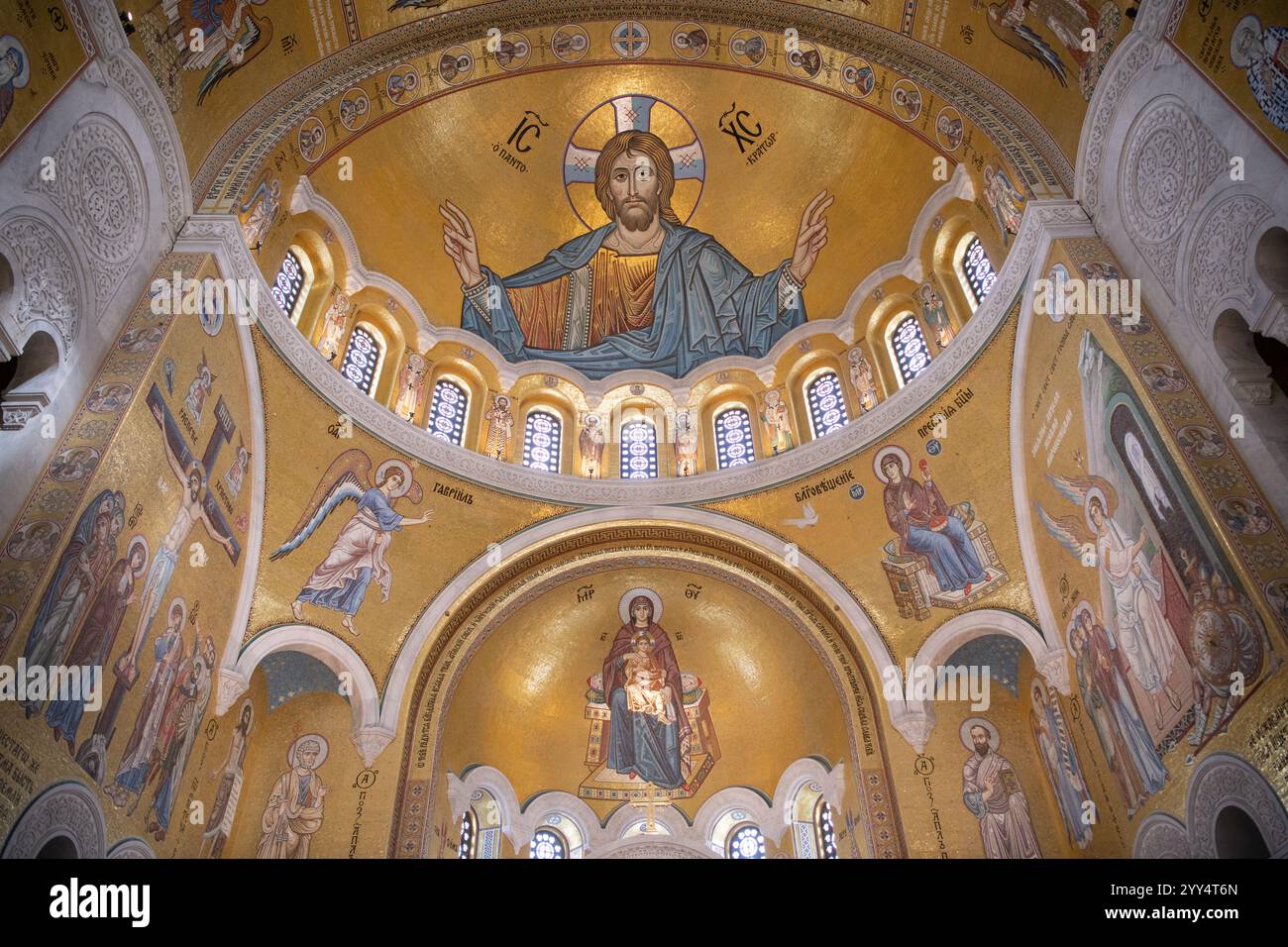 Interiors of St. Sava's Church in Belgrade with religious paintings and mosaics on the ...