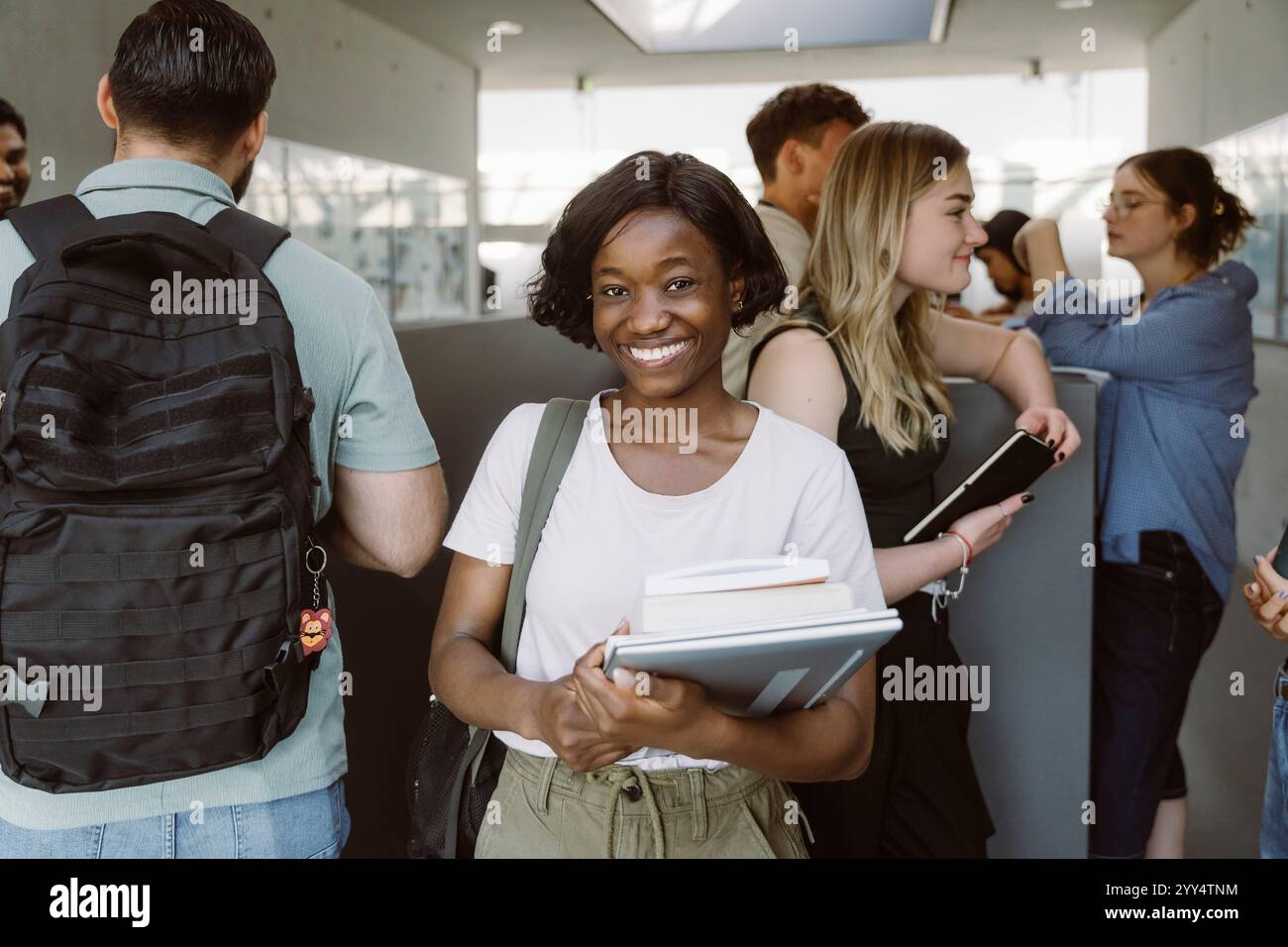 Happy student books hi-res stock photography and images - Alamy