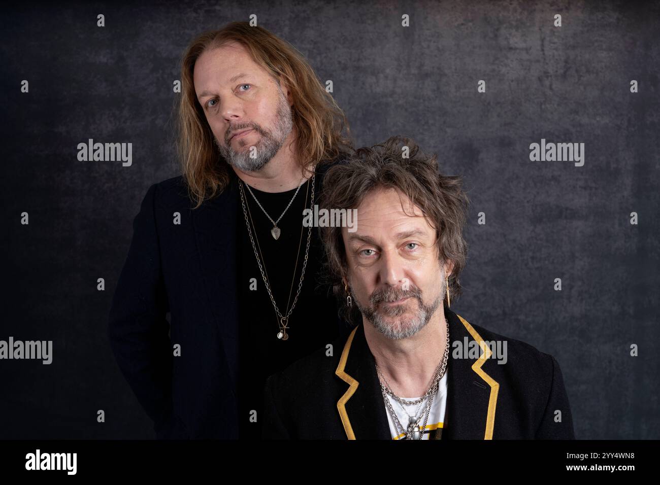 Rich Robinson, left, and his brother Chris Robinson of The Black Crowes ...