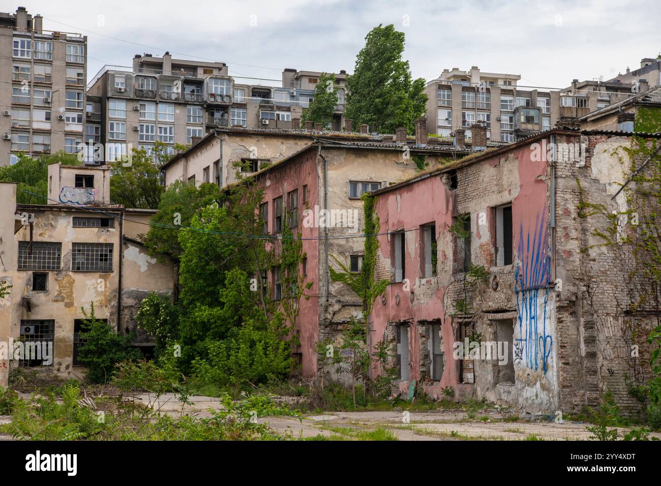 Abandoned industrial buildings. Apocalyptic scene. Ruins of large ...