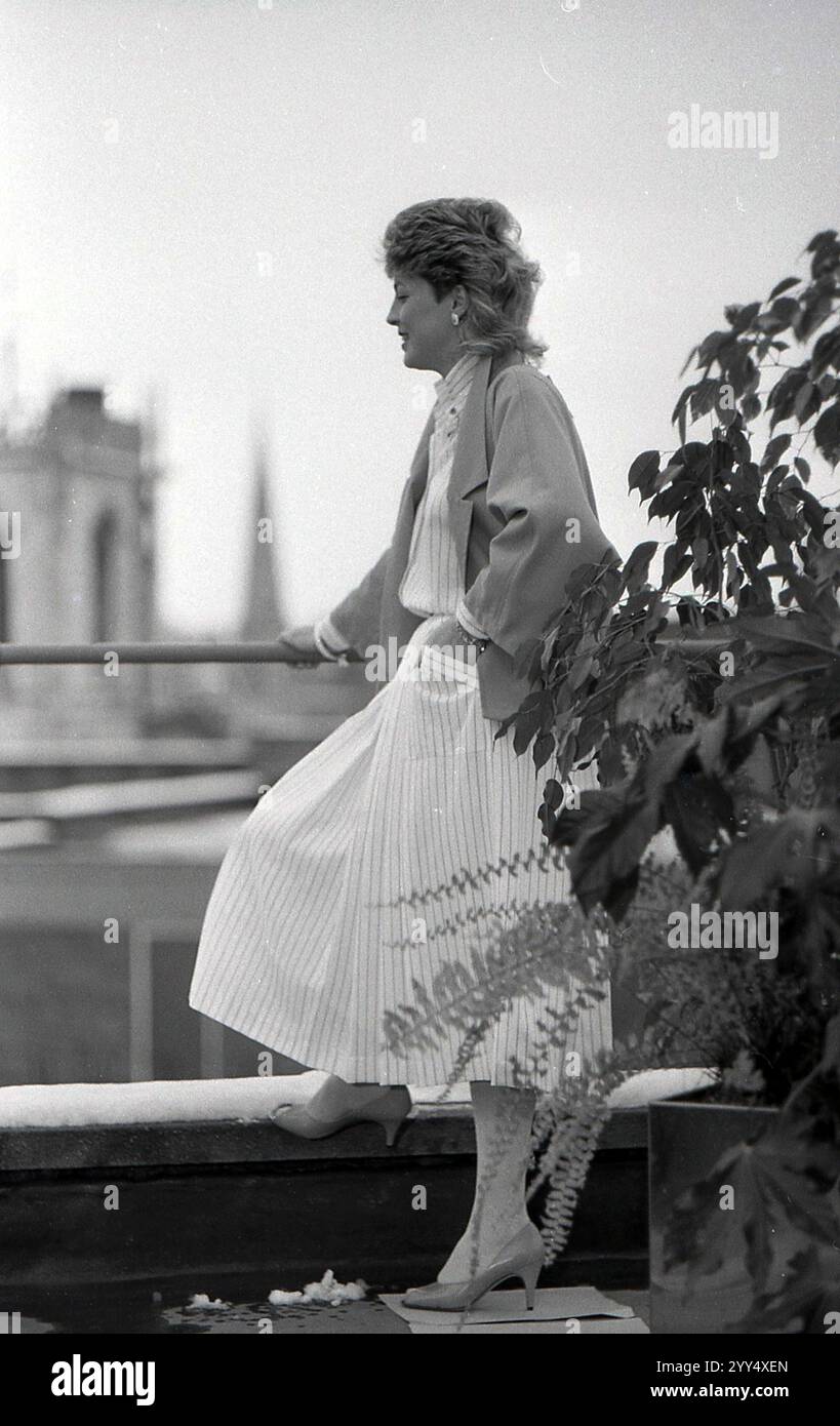 1985, historical, young women standing outside modelling latest female ...