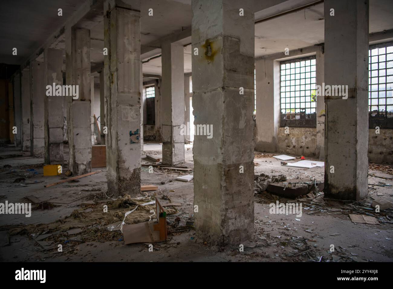 Abandoned industrial building interior. Apocalyptic scene. Ruins of ...