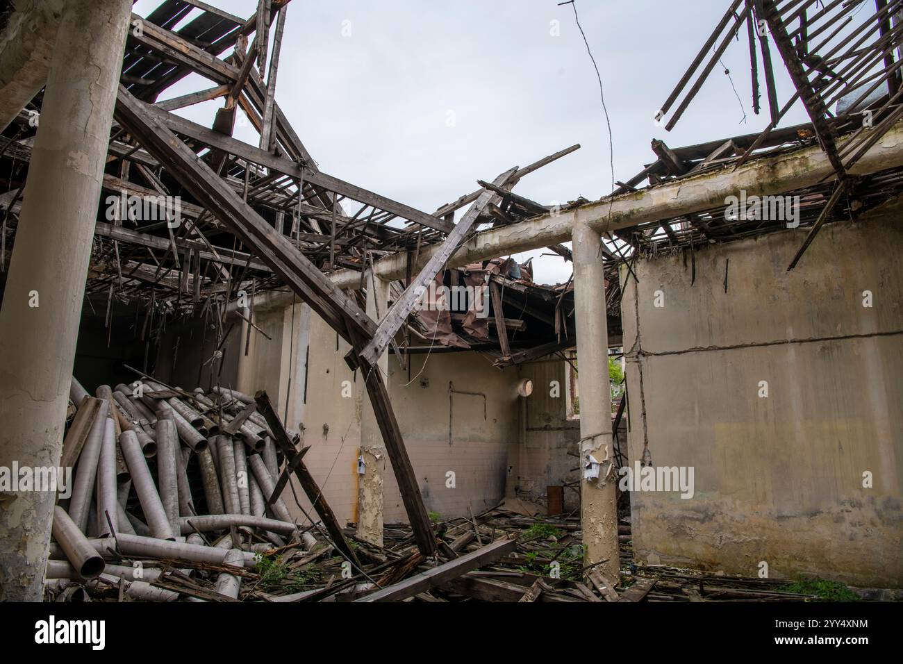 Abandoned industrial building interior covered with dangerous acid and ...