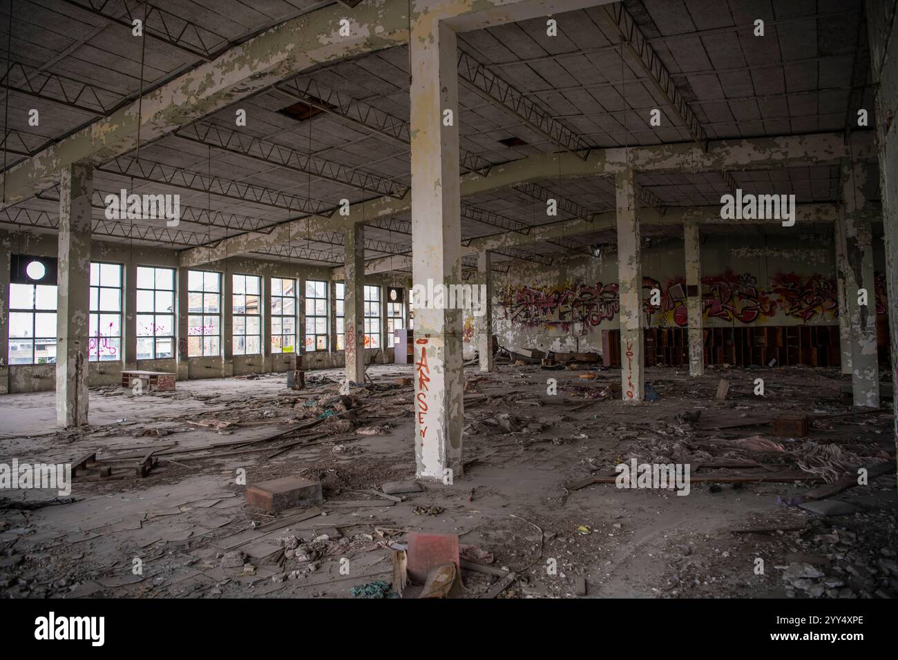 Abandoned industrial building interior. Apocalyptic scene. Ruins of ...