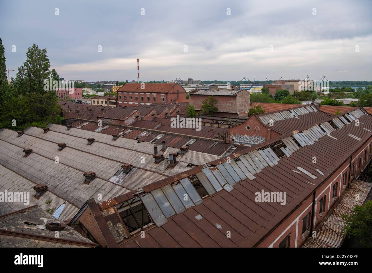 Abandoned industrial buildings. Apocalyptic scene. Ruins of large ...