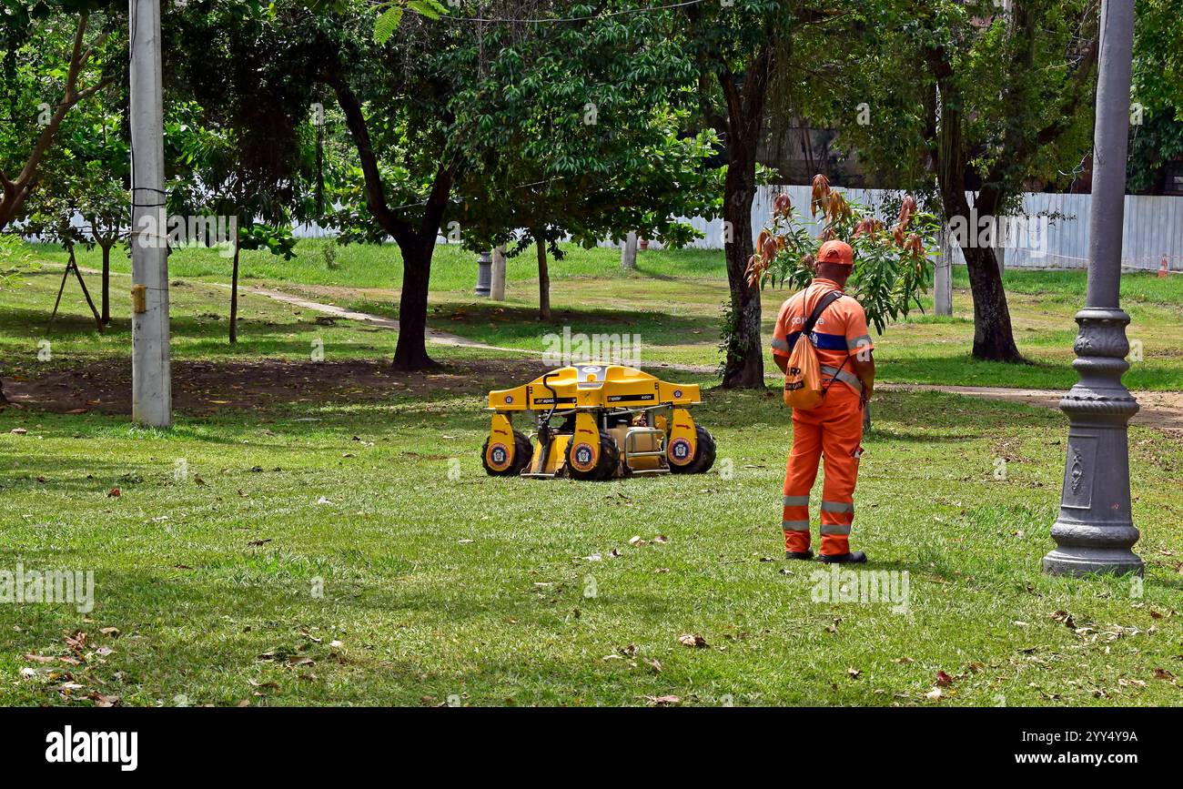 RIO DE JANEIRO, BRAZIL - December 13, 2024: Worker operating automatic ...