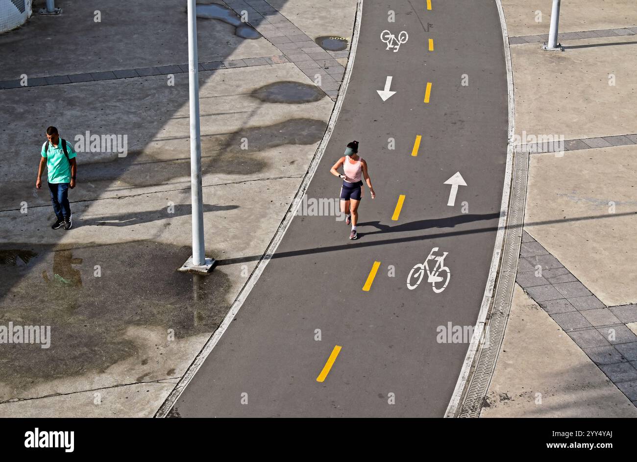 RIO DE JANEIRO, BRAZIL - December 13, 2024: People walking and running ...