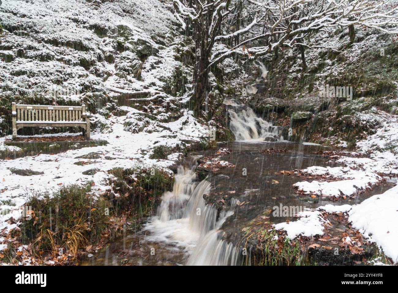 Mountain waterfall and rest area in winter storm Elan Valley Wales UK ...