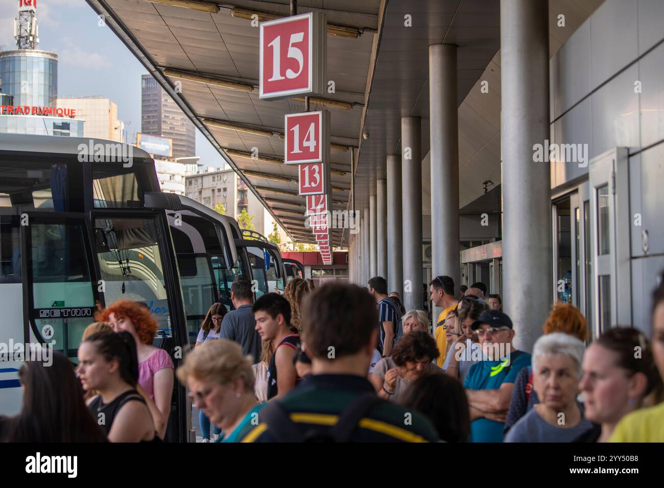 Crowd people waiting bus stop hi-res stock photography and images - Alamy