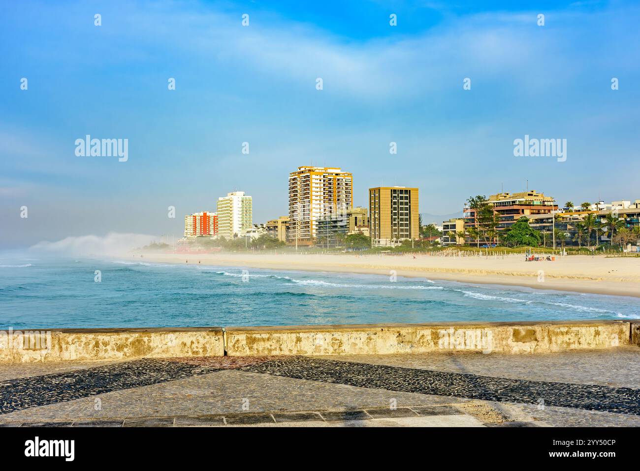 Morning on the breakwater of Barra da Tijuca beach, one of the most ...