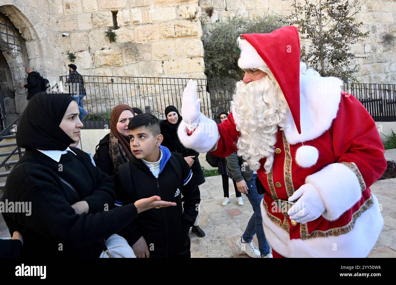 Old City Jerusalem, Israel. 19th Dec, 2024. Palestinian Christian Issa ...