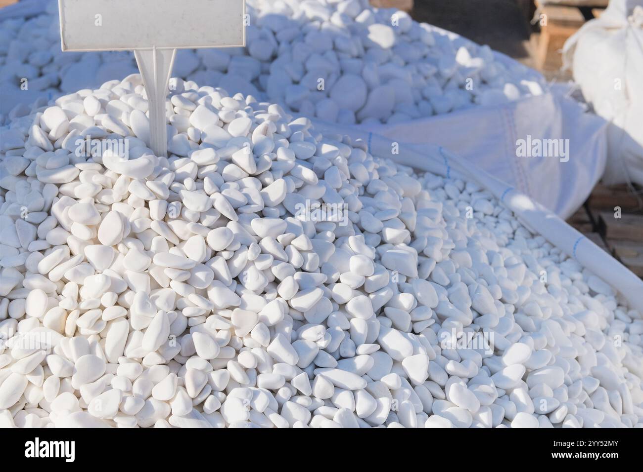 Piles of dolomite stones. Lightweight brick piles on a building project ...