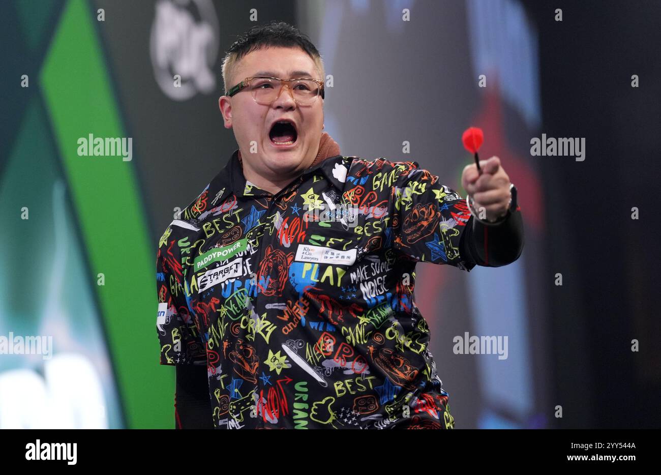 Lok Yin Lee celebrates winning the second set during the first round ...