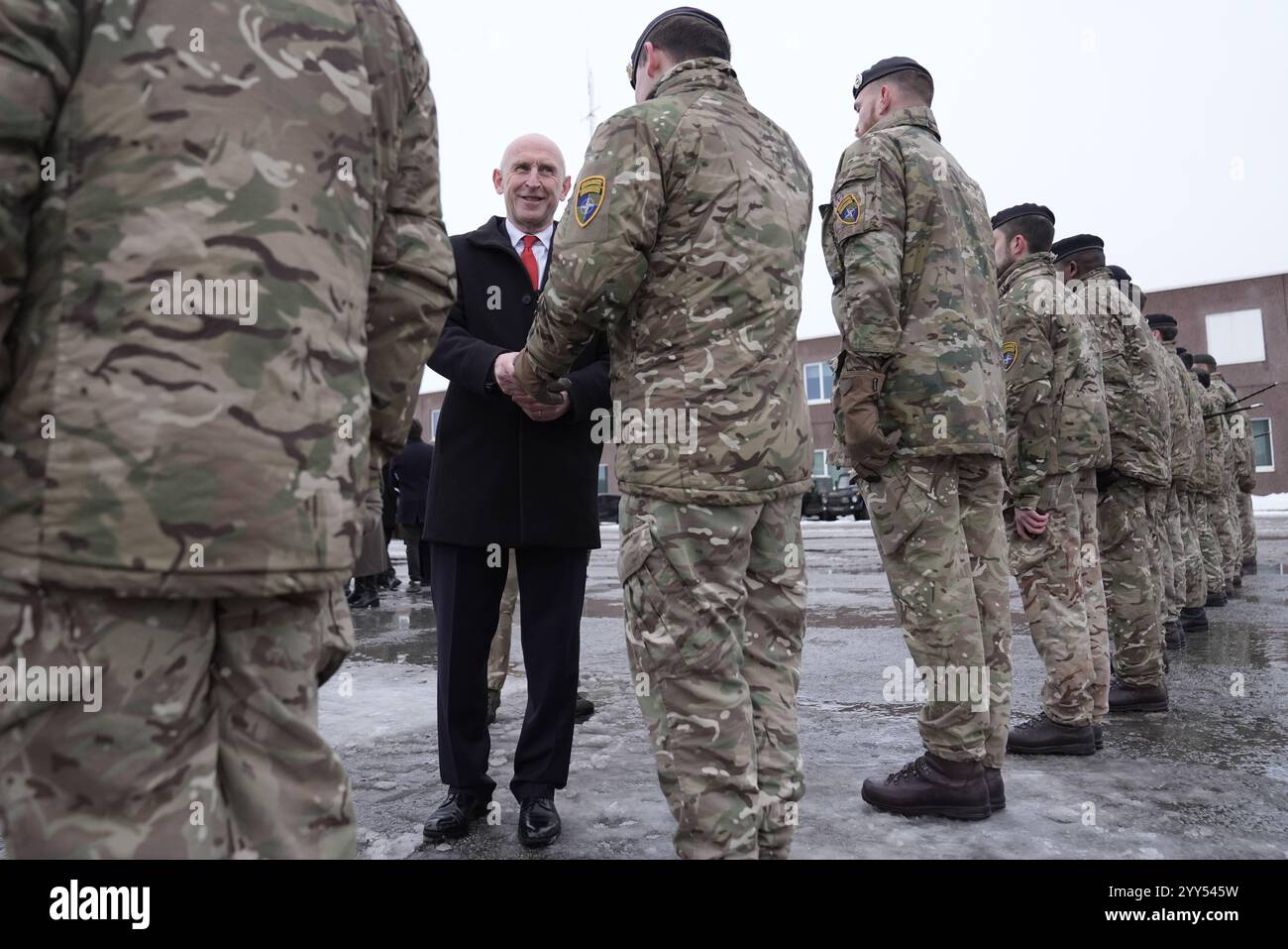 Defence Secretary John Healey giving out Wider Service Medals as he ...