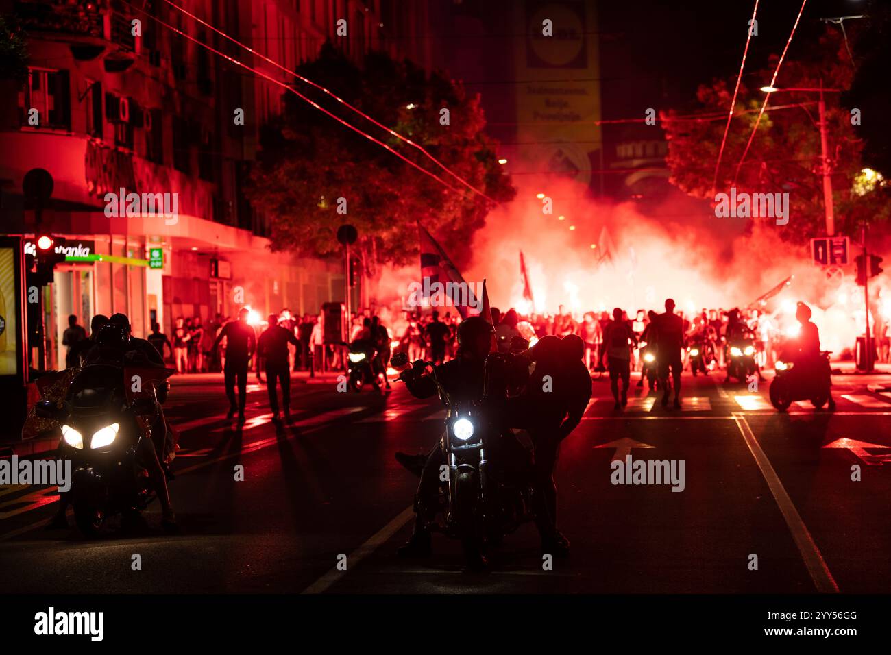 Red Star Football fans with torches and flags marching on streets and ...