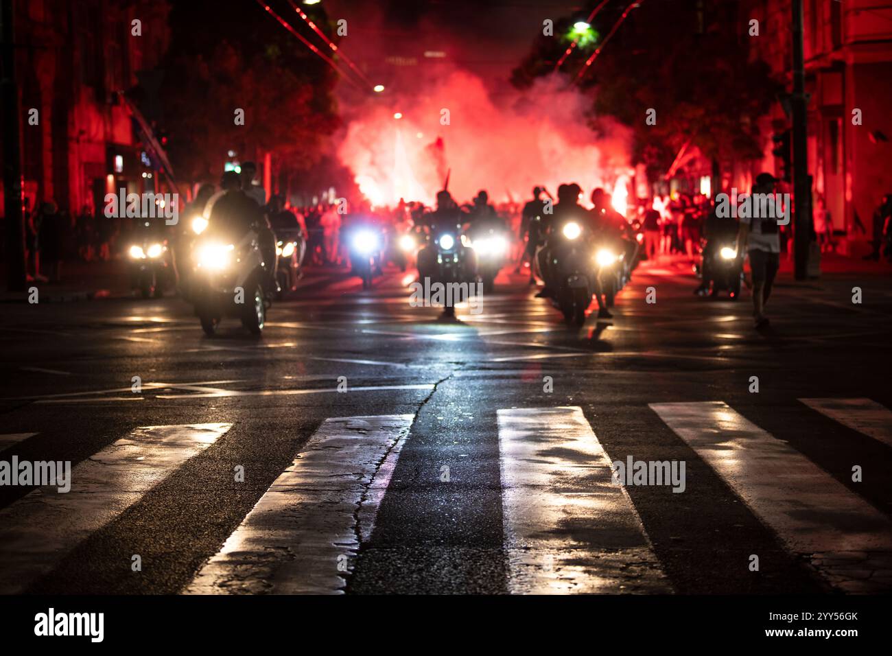 Red Star Football fans with torches and flags marching on streets and ...