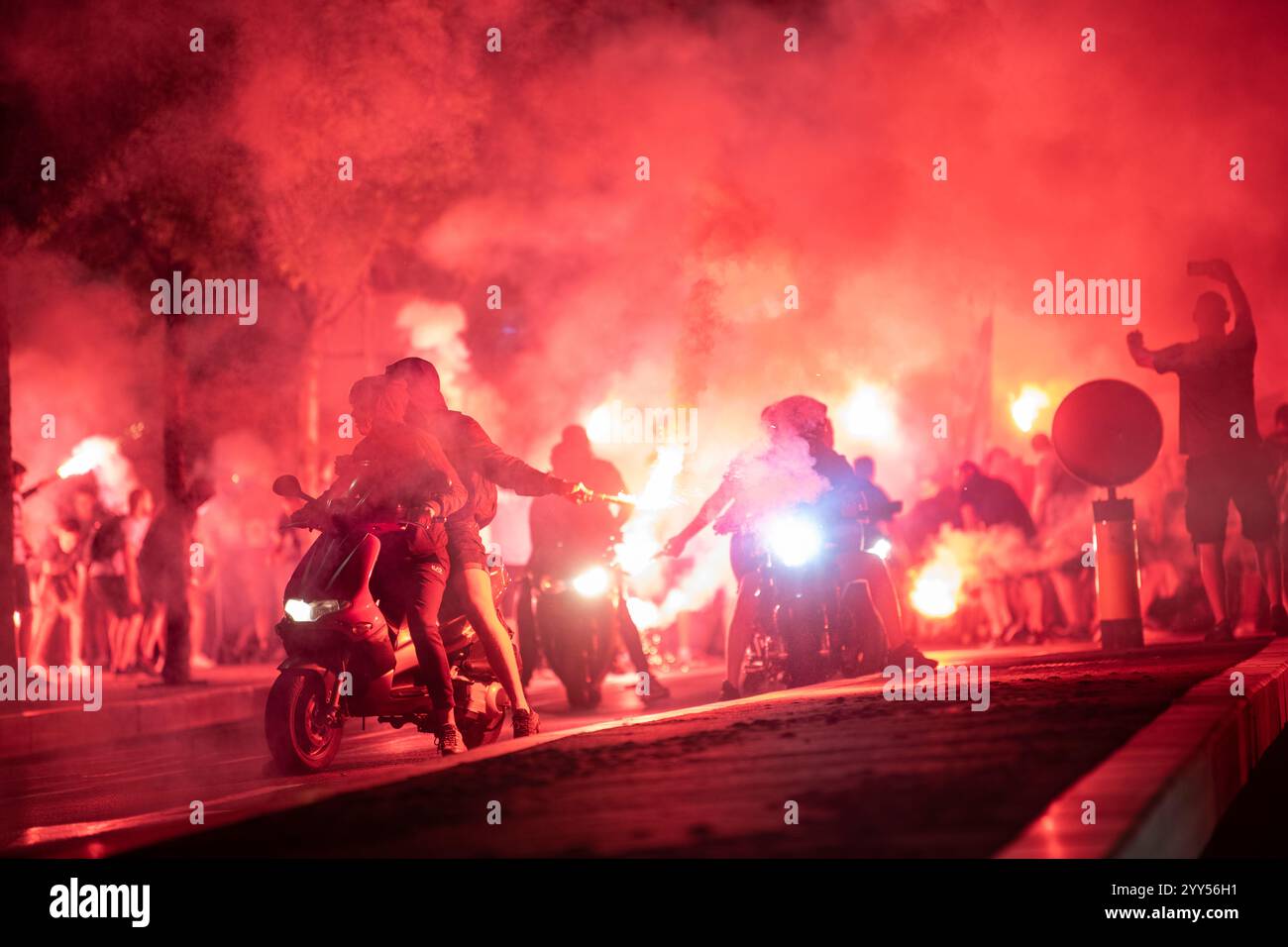 Red Star Football fans with torches and flags marching on streets and ...