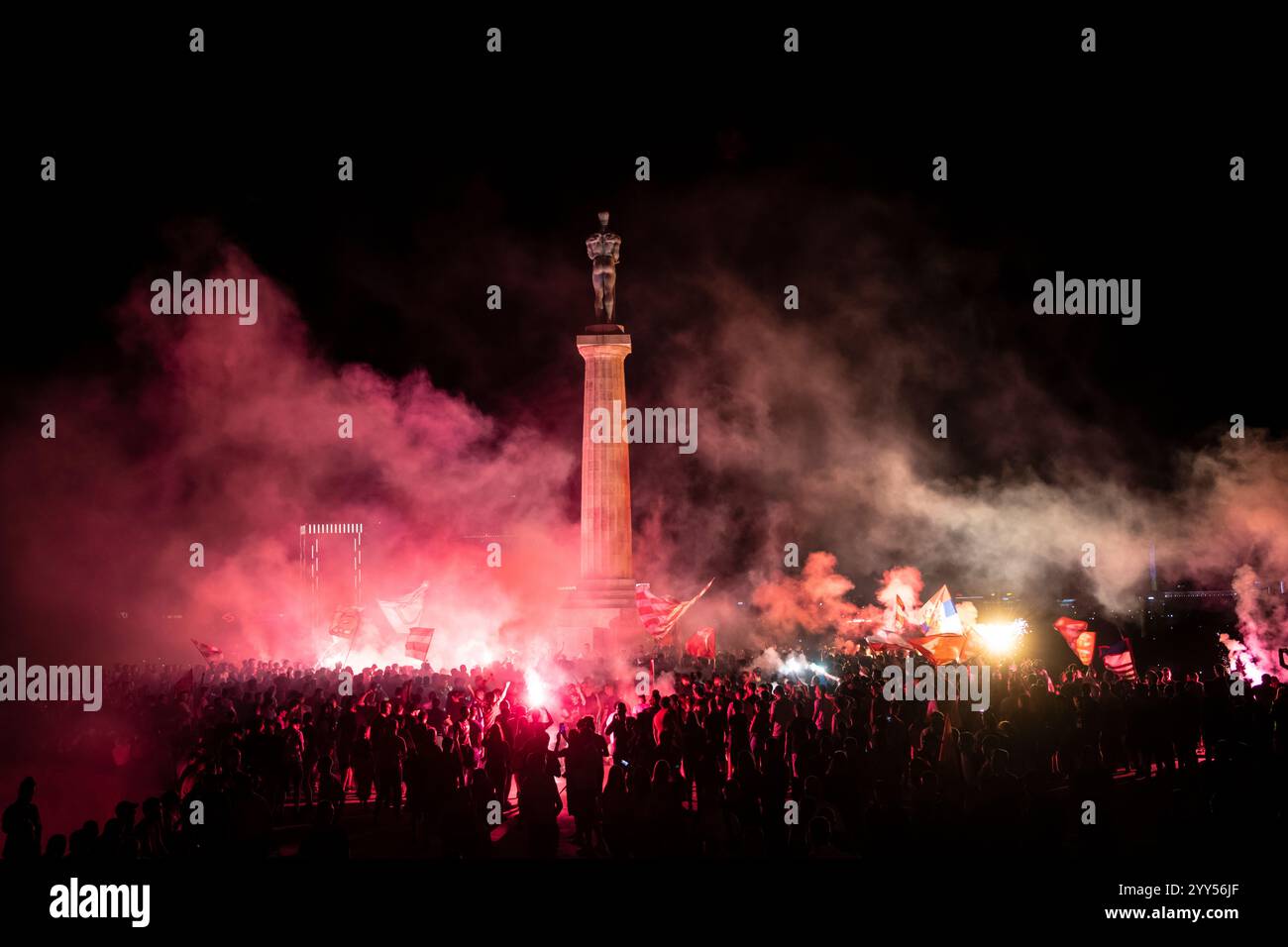 Red Star Football fans with torches and flags celebrating league title ...