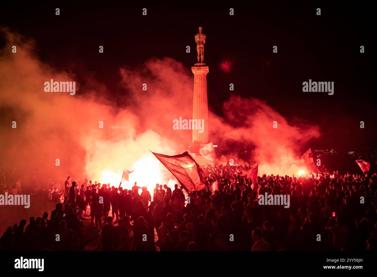 Red Star Football fans with torches and flags celebrating league title ...