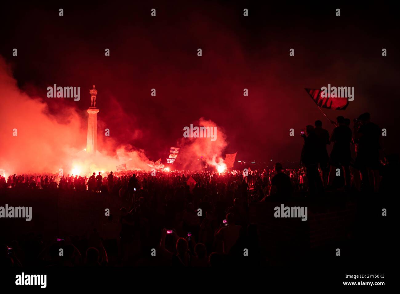 Red Star Football fans with torches and flags celebrating league title ...