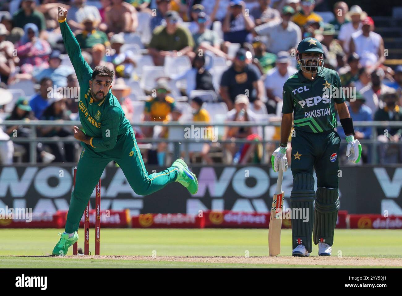 South African bowler Tabriz Shamsi, left, bowls while Pakistans Babar ...