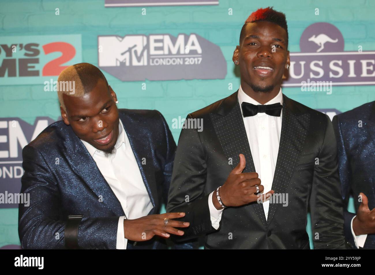 FILE - Soccer players Mathias Pogba, left, and Paul Pogba pose for ...