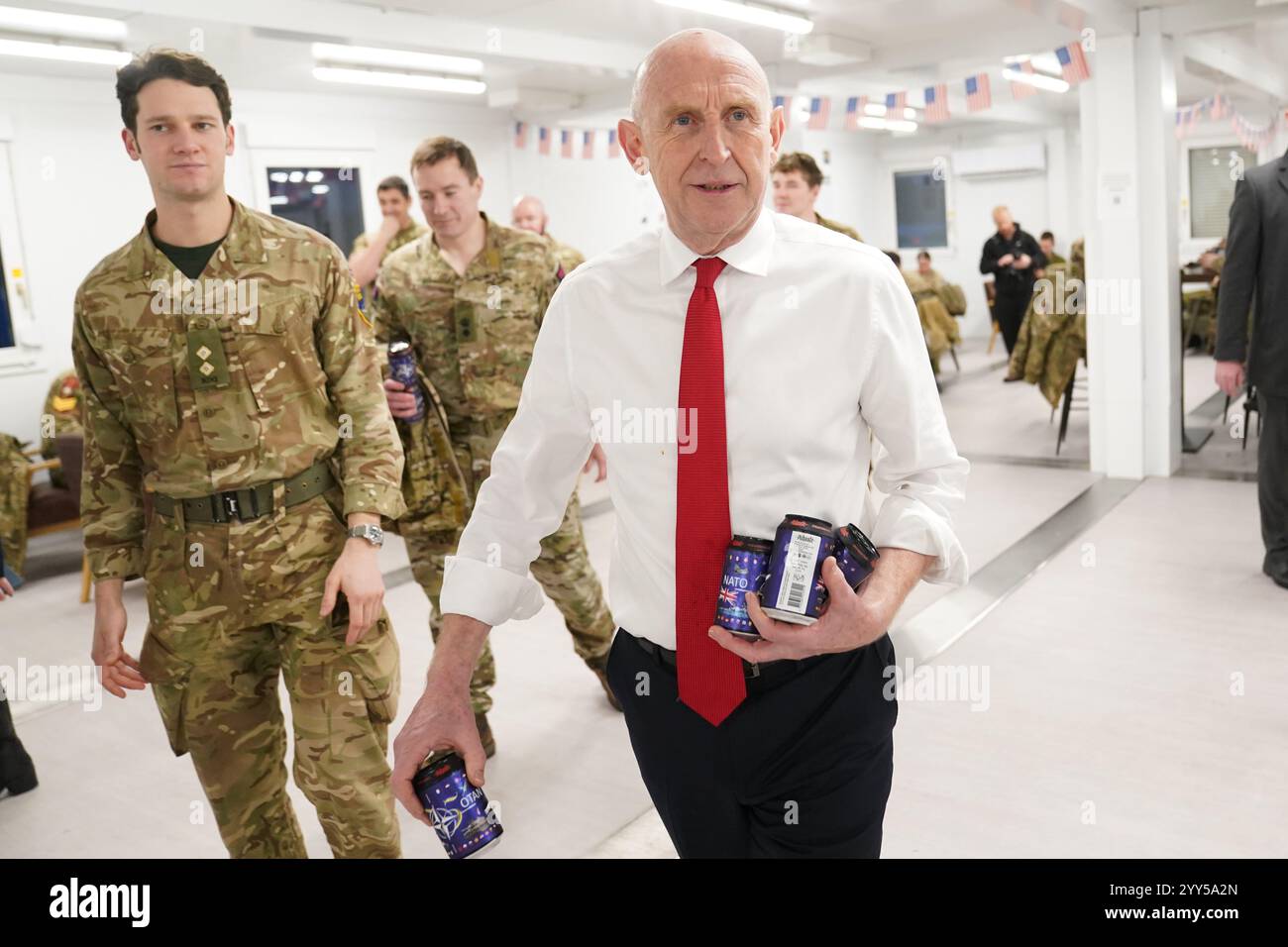 Defence Secretary John Healey giving out cans of drink as he meets ...