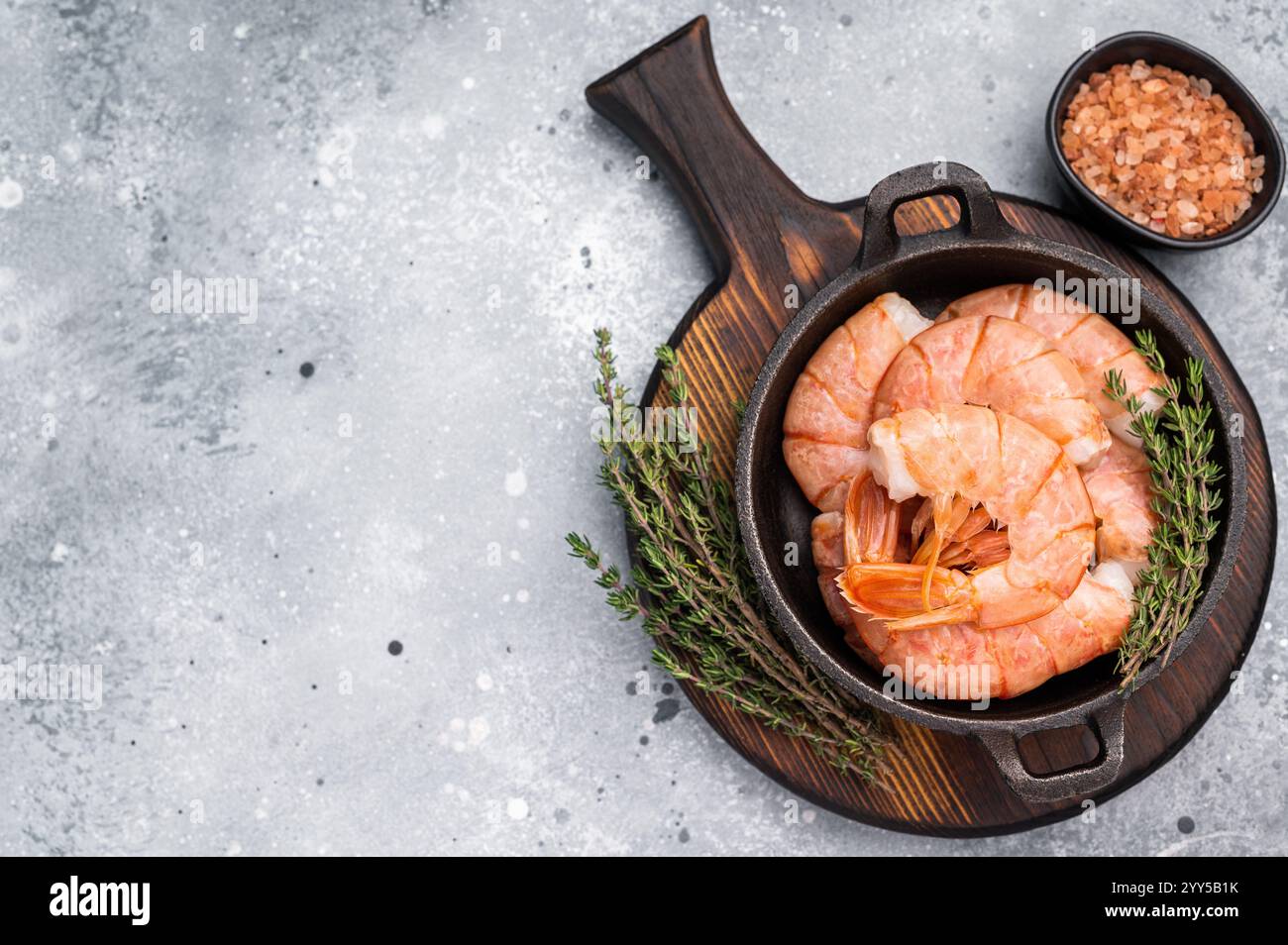 Raw Headless Red Argentine shrimps, Prawns in a skillet. grey ...
