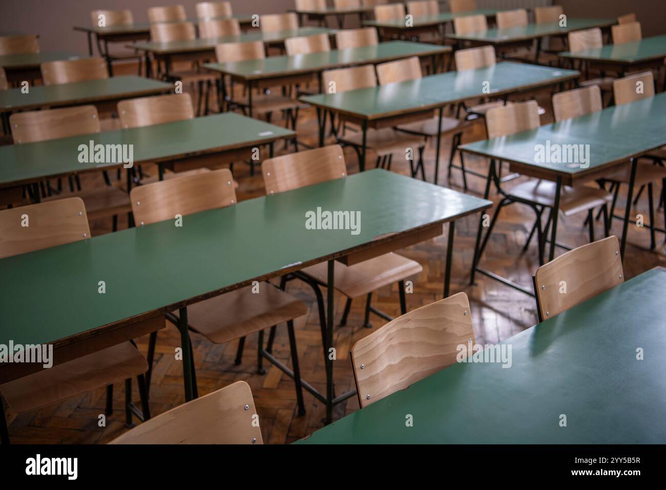Empty old faculty or college School classroom with row of chairs and ...