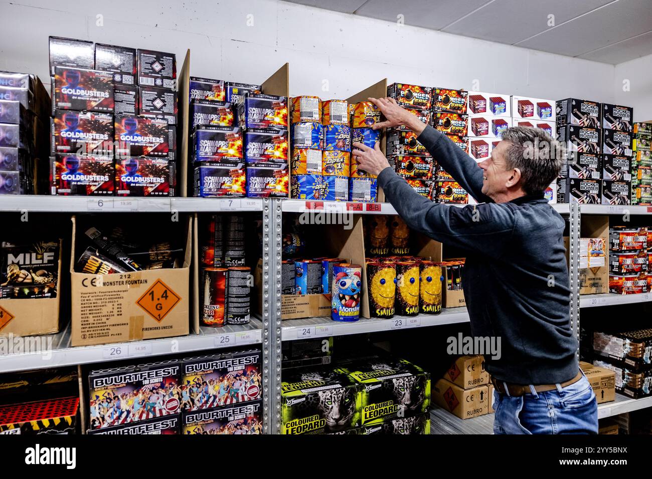 AMSTERDAM - Employees of a fireworks store prepare for the opening ...
