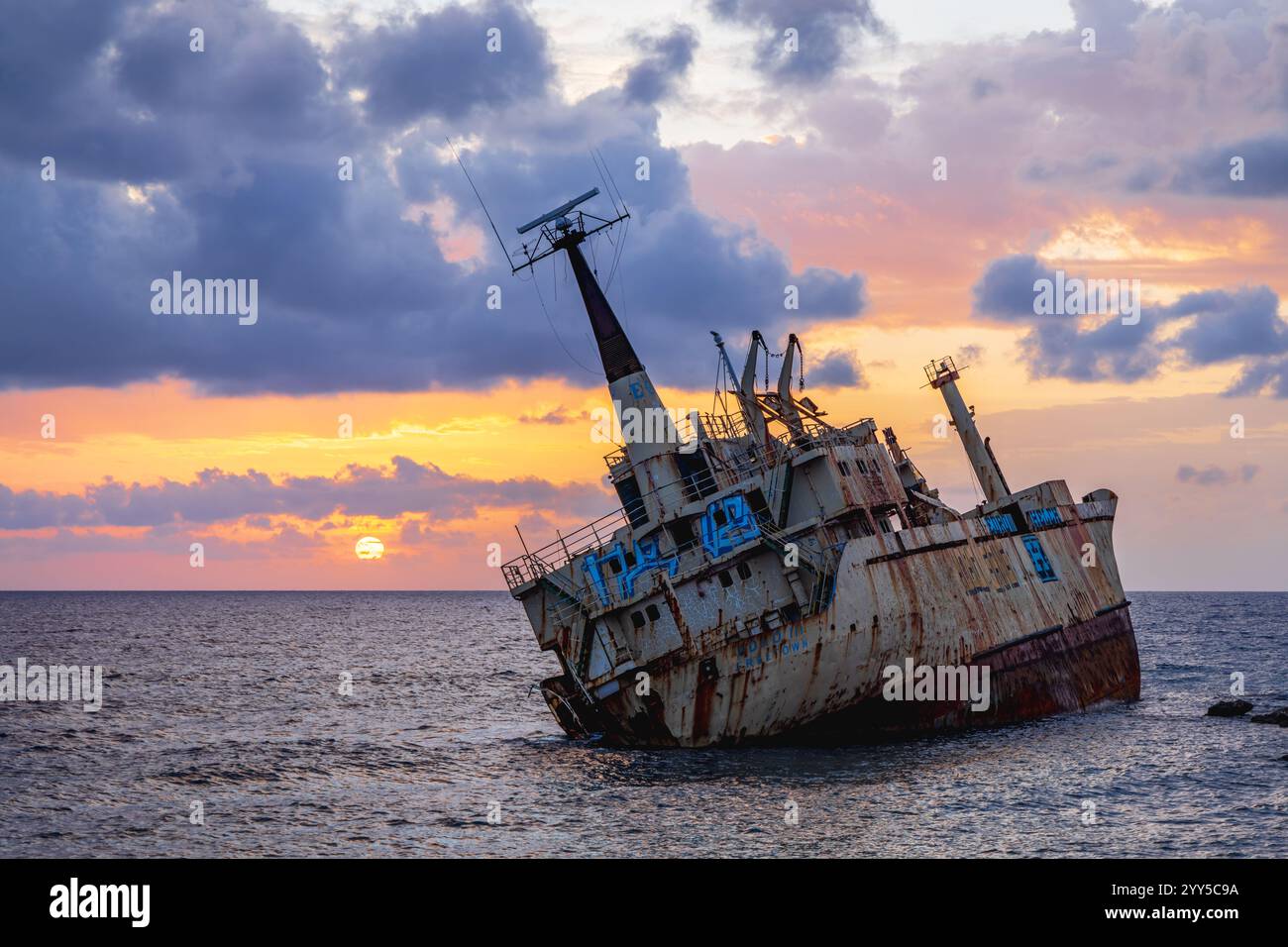 Sunset view of the shipwreck of Edro III at Seacaves, Peiya, Cyprus ...