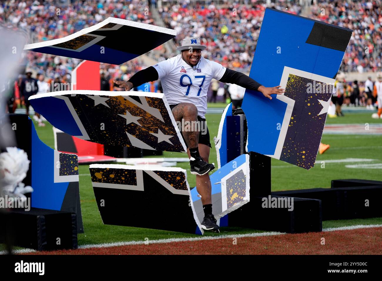 FILE - NFC Dexter Lawrence, of the New York Giants, breaks through a ...