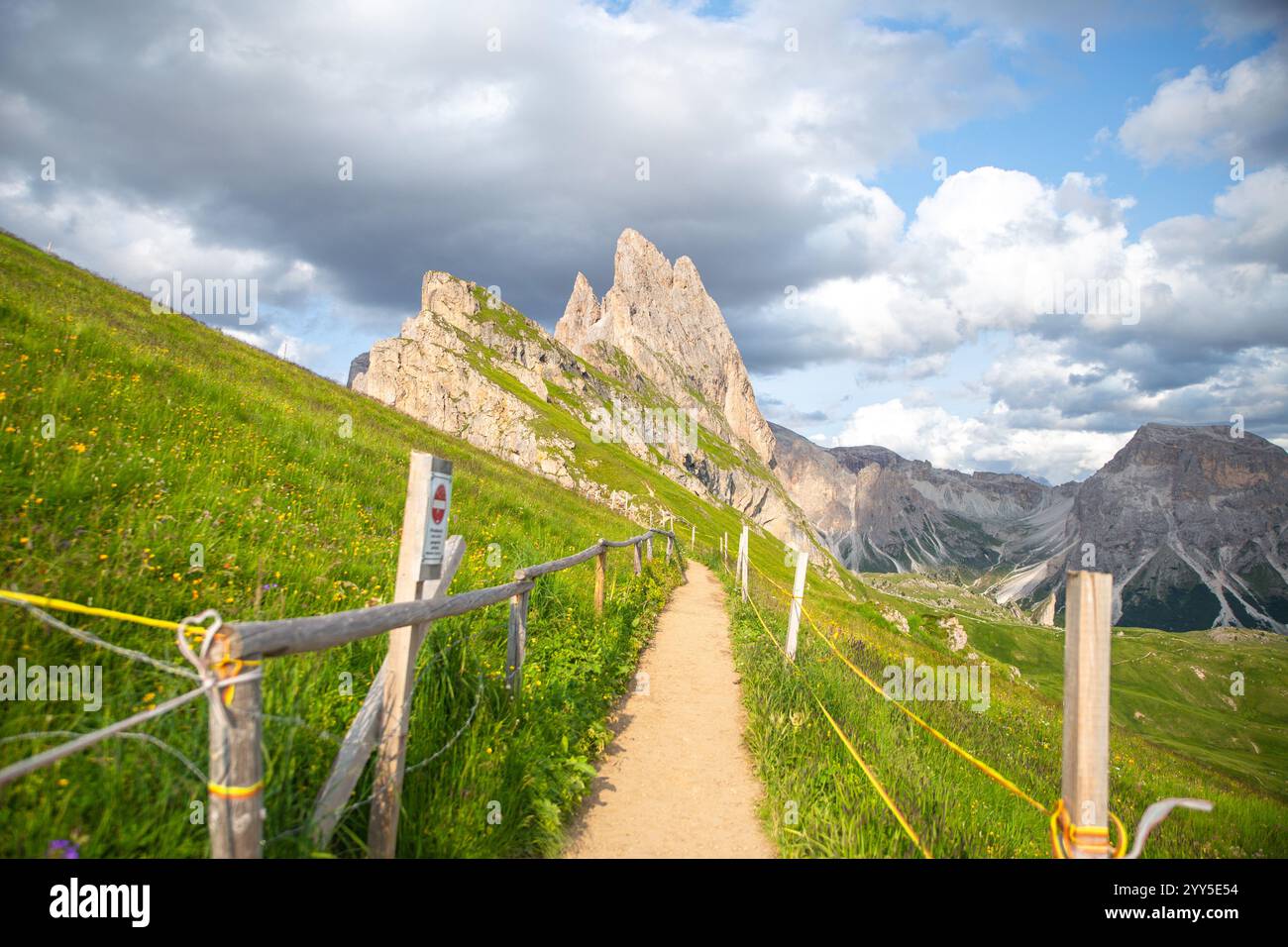 background image, a hiking trial up to the Seceda mountain peak ...