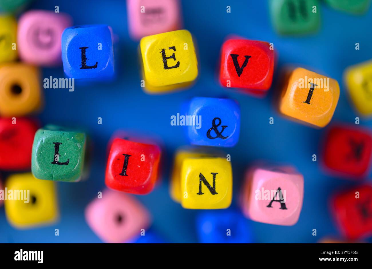 Leipzig, Germany. 27th Nov, 2024. Toy cubes form the first names Lina ...