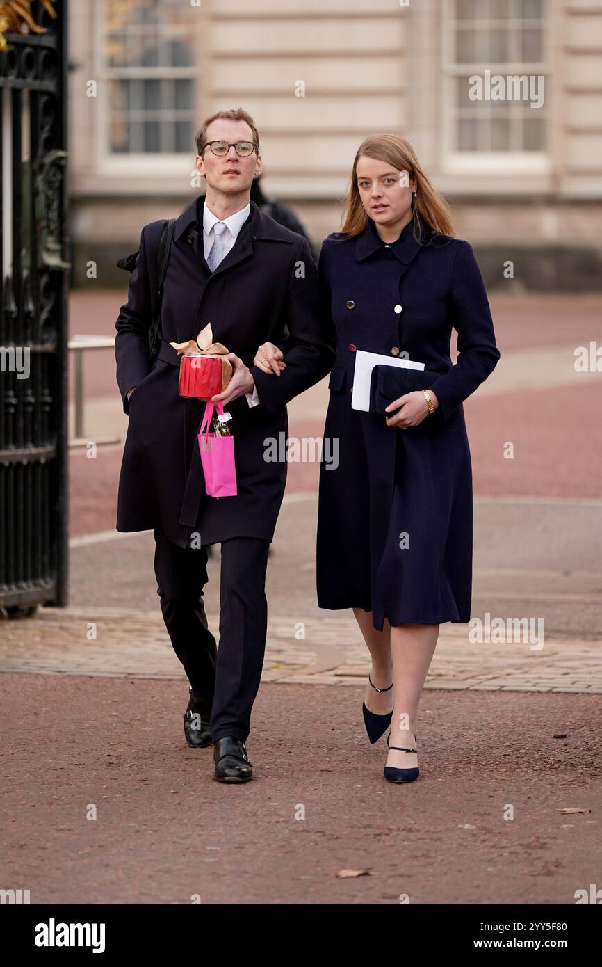Timothy Vesterberg and Flora Vesterberg leave after attending King Charles III's Christmas lunch ...
